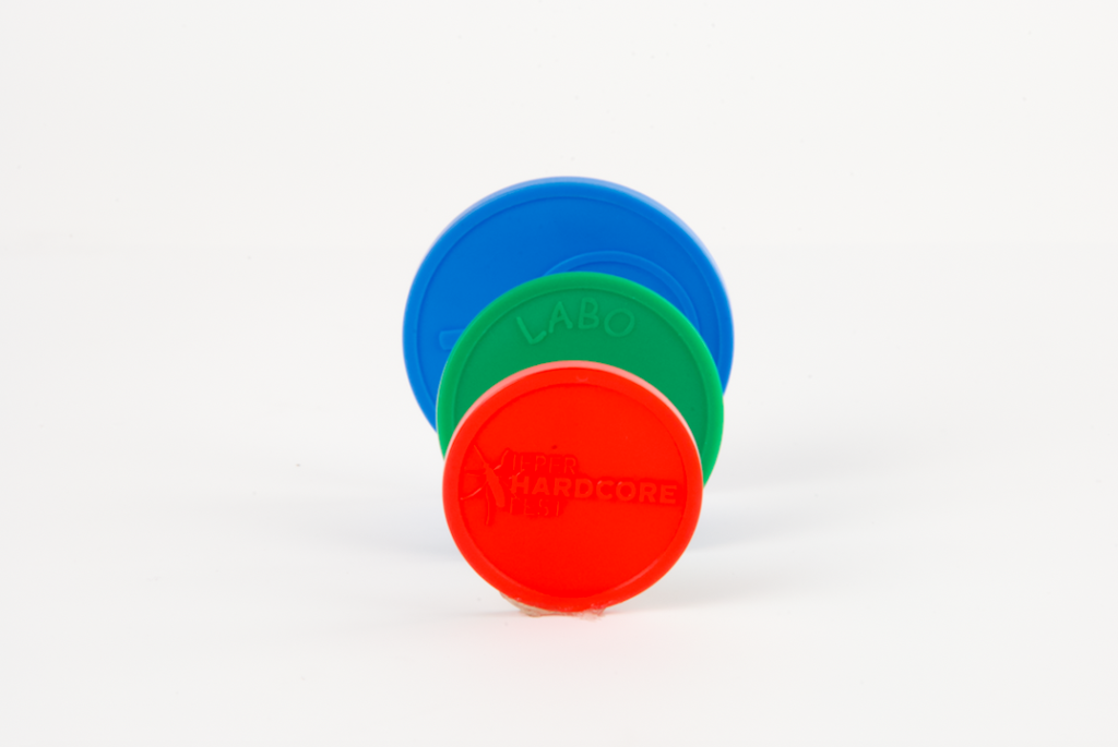 Embossed Plastic Tokens - Akorbel supplier and distributor of custom ...