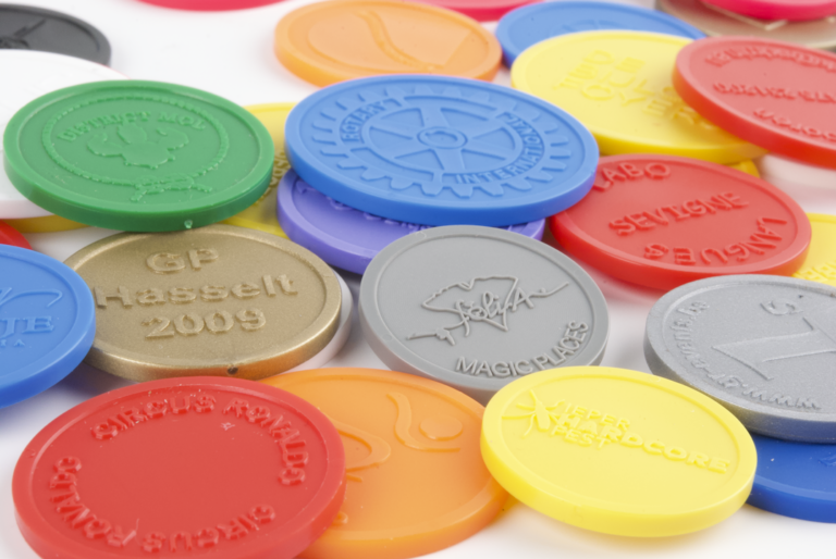 Embossed Plastic Tokens - Akorbel supplier and distributor of custom ...